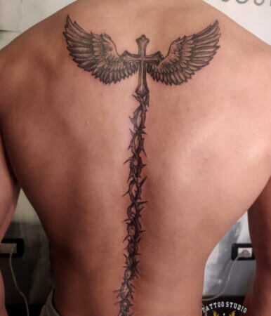 40 Latest Spine Tattoo Design Ideas For Men in 2024
